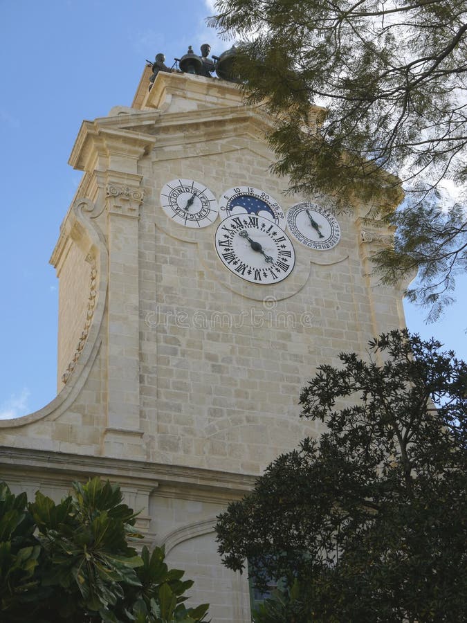 Old Tower with Wall Church Clock, Calender and Bells Stock Image ...