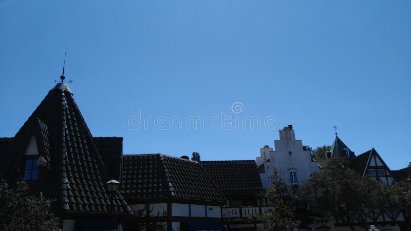 Old town Rooftops blue sky stock photo. Image of roof - 77211992