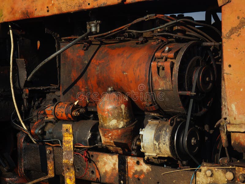Old Tractor Engine. Rusty Agricultural Machine. Orange Engine Stock ...