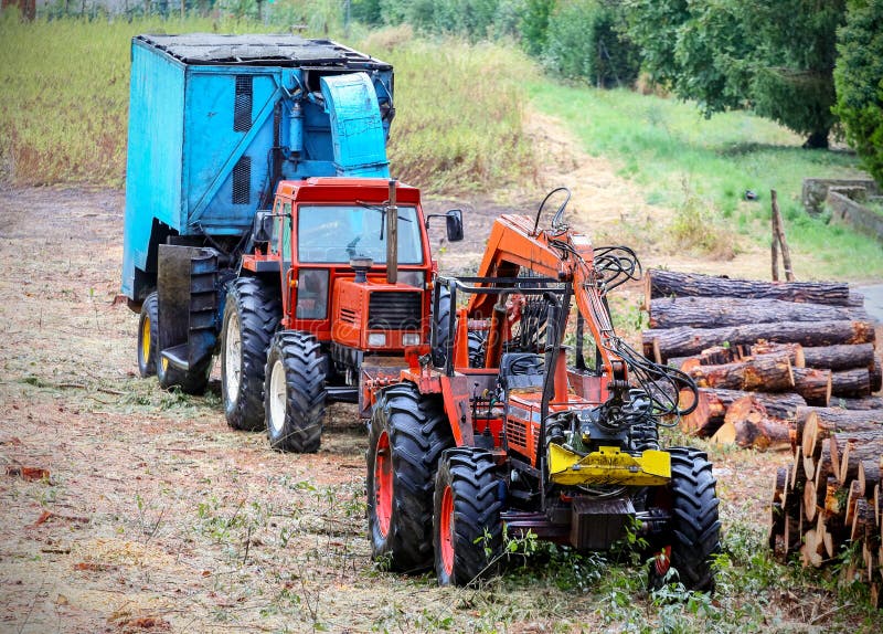 Old Tractor and Equipment Used in Timber Industry. Stock Photo - Image ...