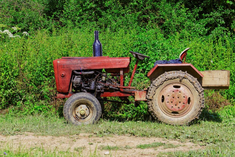 Old tractor stock image. Image of meadow, rusty, metal - 82216721