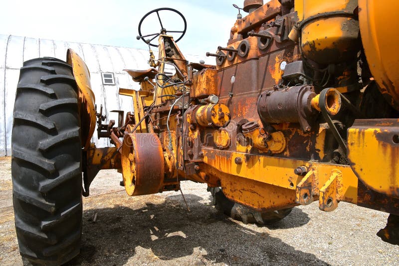 Rusty Mains of an Old Tractor Stock Image - Image of mechanical, yellow ...