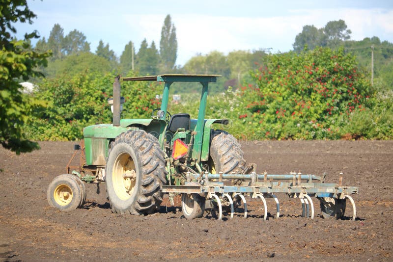 Old Tractor and Plow in Field Editorial Photography - Image of farm ...