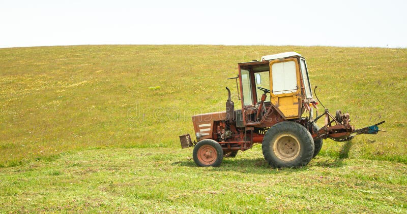 Old Tractor Standing in a Field Stock Image - Image of summer ...