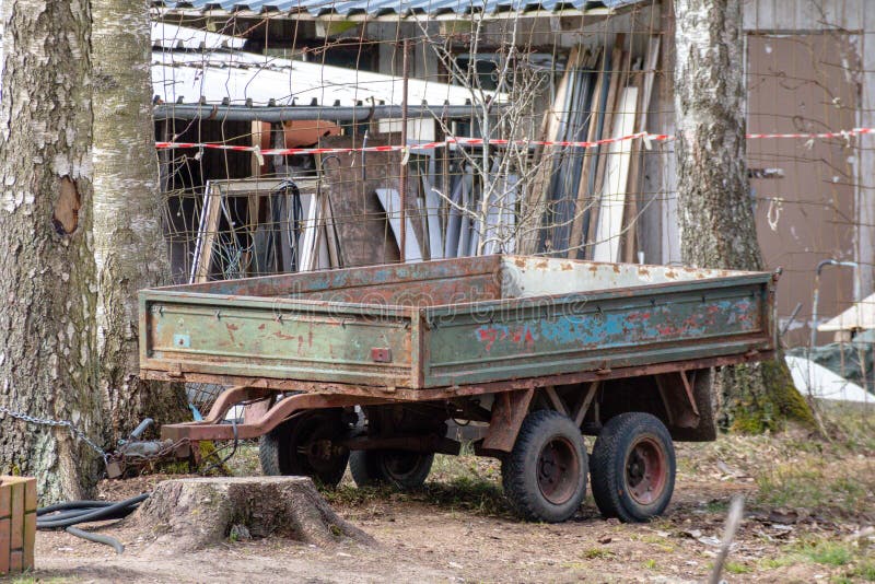 Old Tractor Trailer in the Forest Stock Photo - Image of asphalt ...