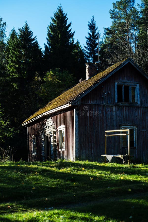 A Traditional Finnish Wooden Cottage With A Sauna And A Barn On The ...