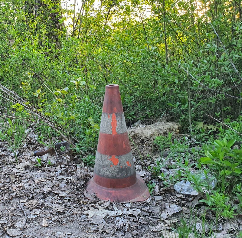 Old Traffic Cone and Other Plastic Trash Stock Photo - Image of debris ...