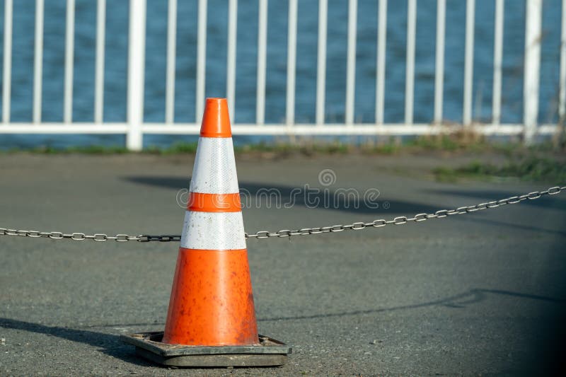 An Old Traffic Cone Sign with Metal Chain Stock Image - Image of iron ...