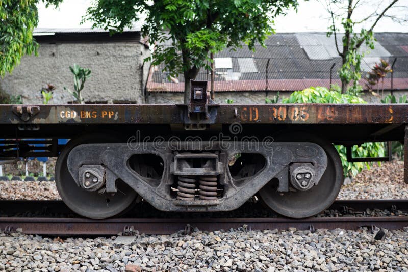 Train Wheels with the Bogie on Railroad with Rusty Metal Surface Stock ...