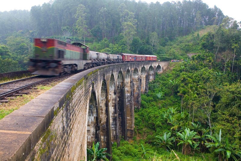The Old Train Goes Over the Nine-arch Bridge Stock Photo - Image of ...