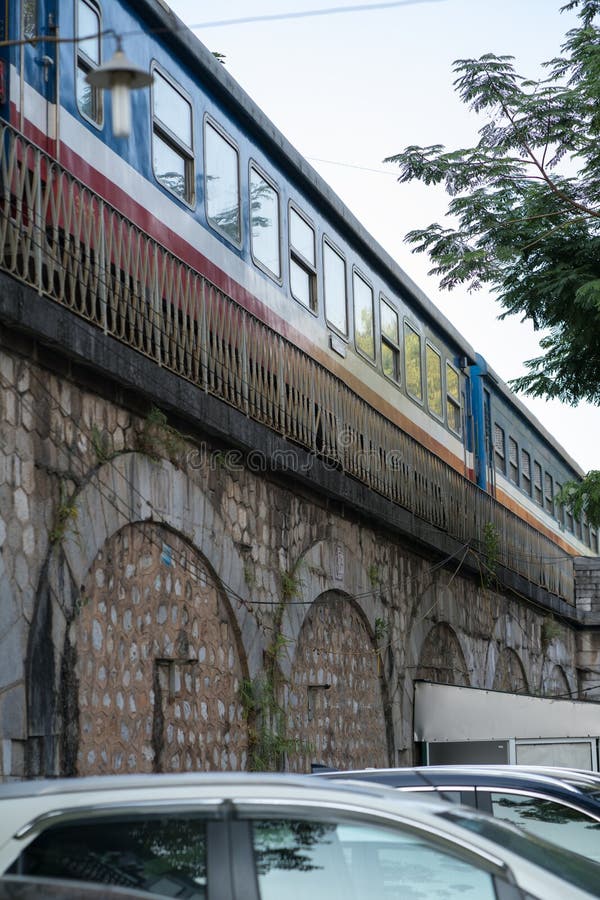 Old Train Running on Railway in Hanoi Street Stock Image - Image of ...