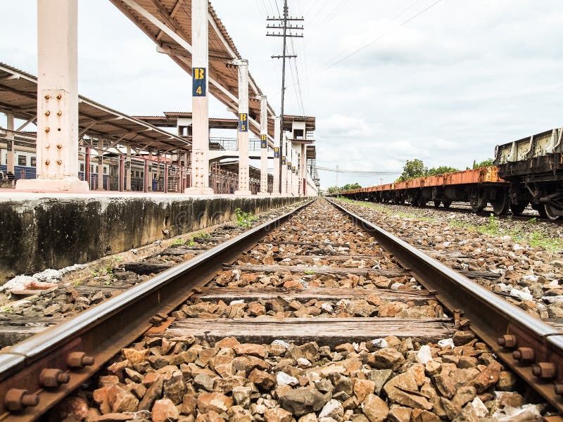 Old Train Station with Rails Stock Photo - Image of heavy, delivery ...