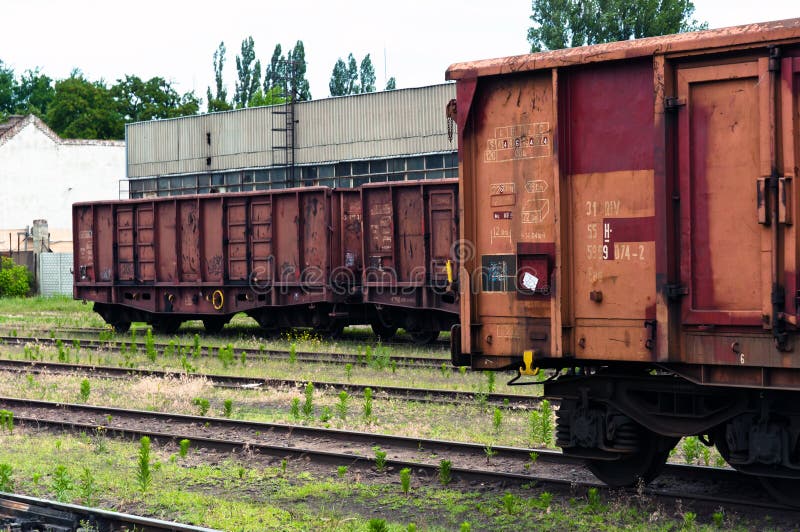 Old trains in a trainyard stock photo. Image of iron - 20977868