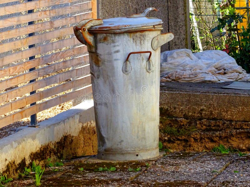 Old trash bin stock image. Image of cleaning, retro - 214769941