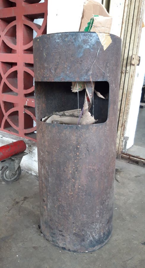 Old Trash Can in Front of the Store Stock Photo - Image of front, wood ...