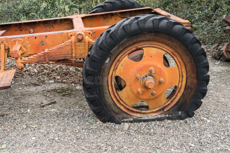Flat tire on an old truck stock image. Image of faded - 30250155