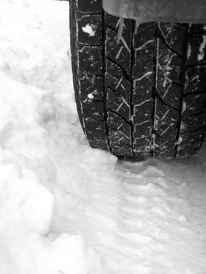 Old Truck Tire in Fresh Snow Stock Photo - Image of tire, rubber: 71530554