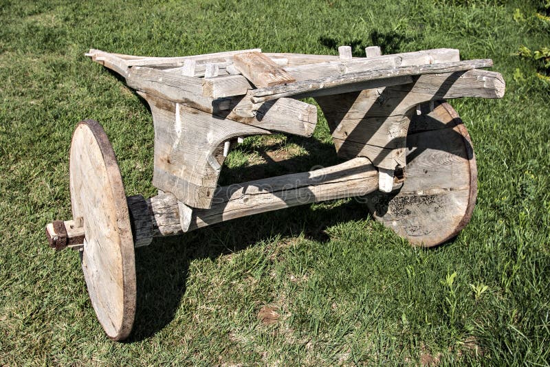 Old tumbrel in garden stock photo. Image of grass, cart - 31368812