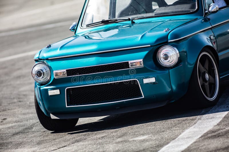 An Old Turquoise Car on Asphalt in the Summer Day in the Sun Stock ...