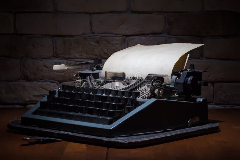 Old typewriter on table stock image. Image of equipment - 164930675