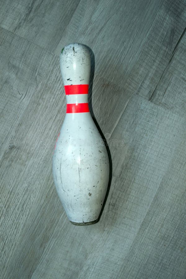 A Single Old Bowling Pin on Grey Floor Stock Image - Image of icon ...