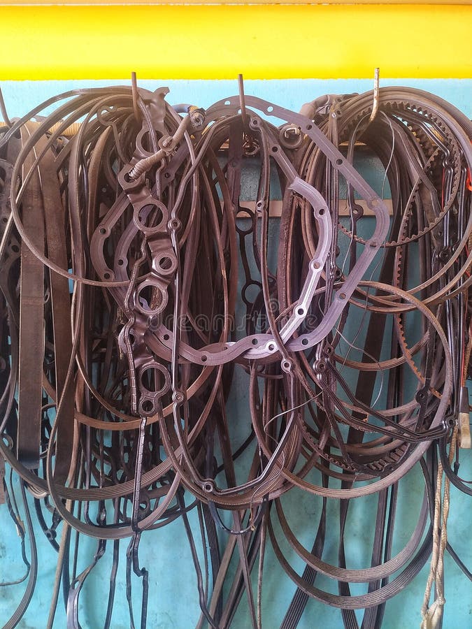 Old Used Car Engine Belts in a Garage Stock Image - Image of statue ...