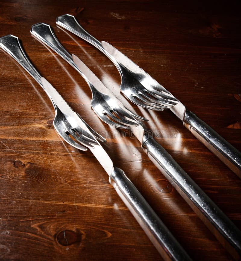 Old Used Cutlery on Dark Wooden Table Stock Photo - Image of ...