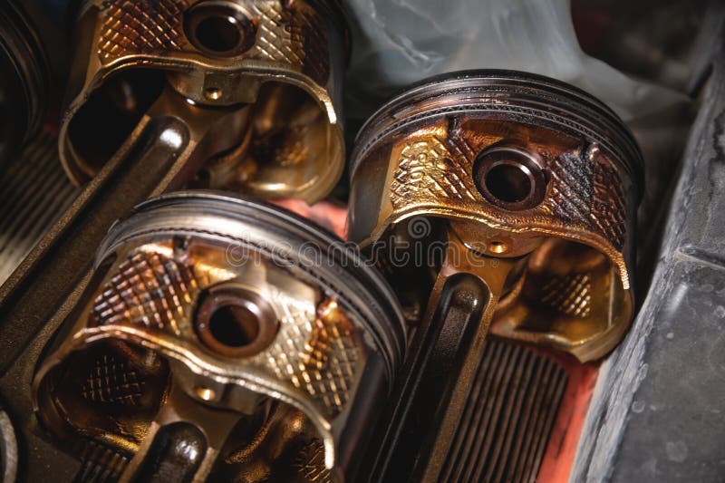 Old Used Engine Pistons Close Up. Four Pistons from an Old Disassembled ...