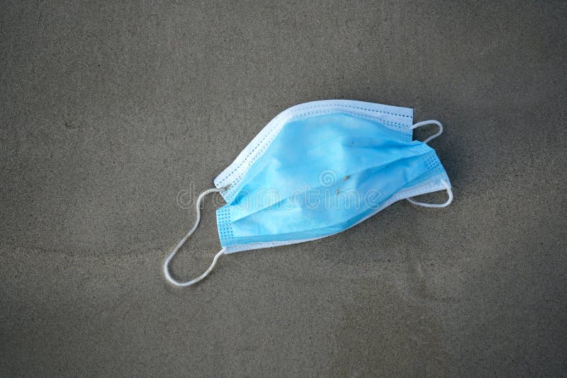Old Used Medical Mask Polluting the Beach Stock Image - Image of corona ...