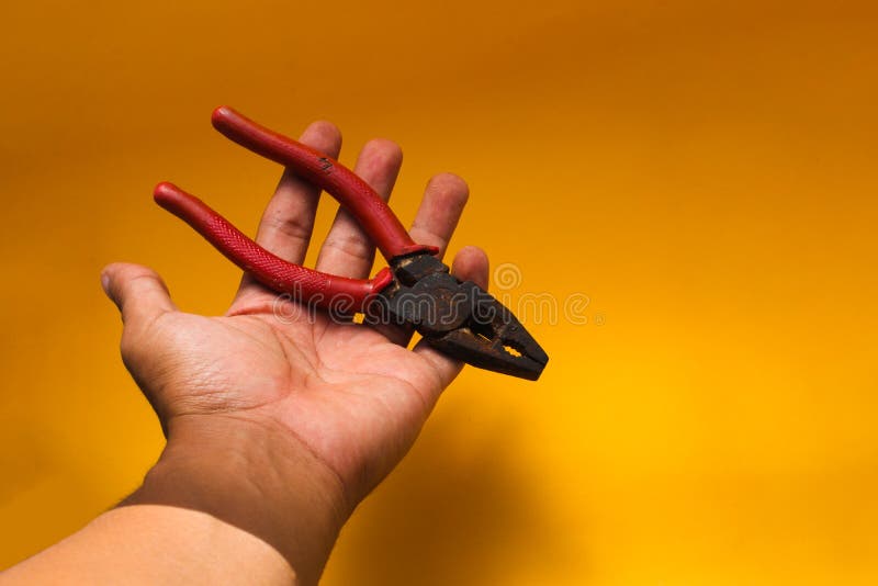 Pliers with Reg Grip Isolated on Orange Background Stock Photo - Image ...