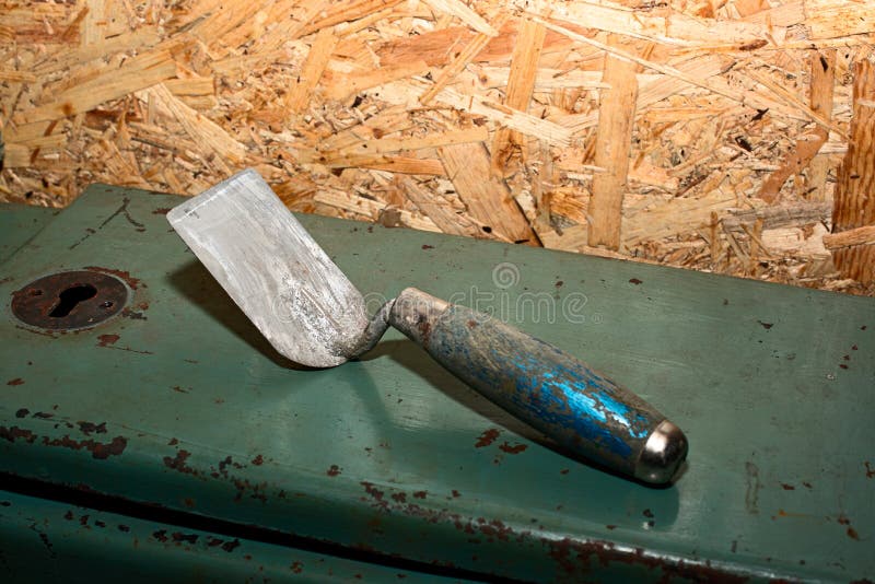 Old used trowel for repair stock photo. Image of rusty - 97932852