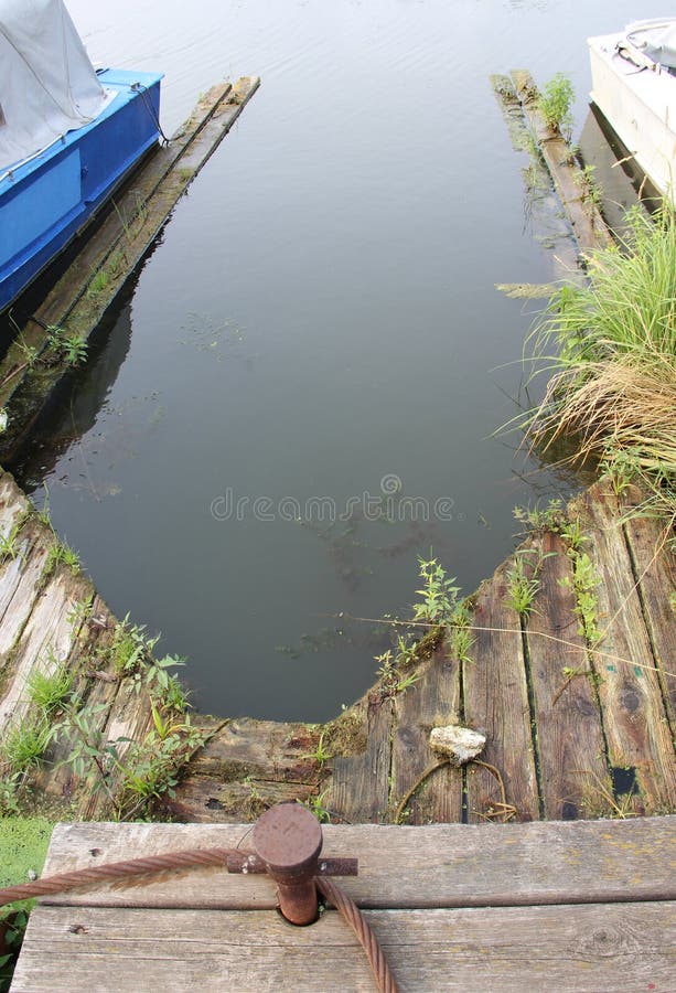 An Old Vacant Mooring Place for a Boat Stock Image - Image of iron ...