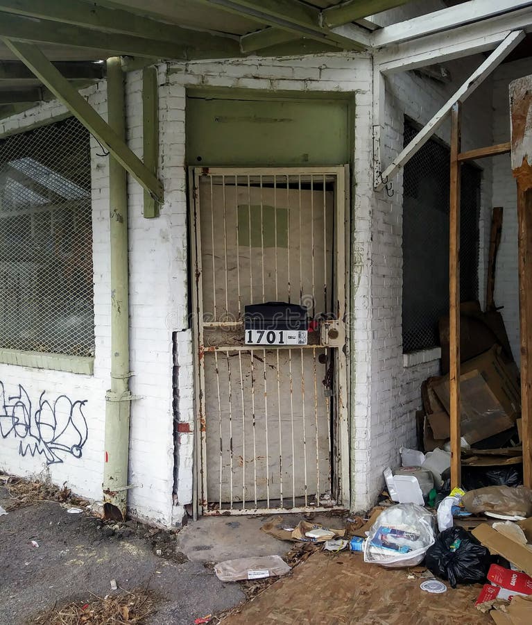 Decaying Storefront with Broken Windows Stock Photo - Image of ...