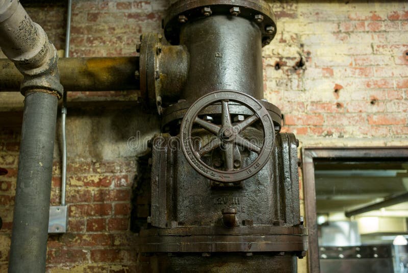 Old valve with pipes stock image. Image of brass, steel - 55093485