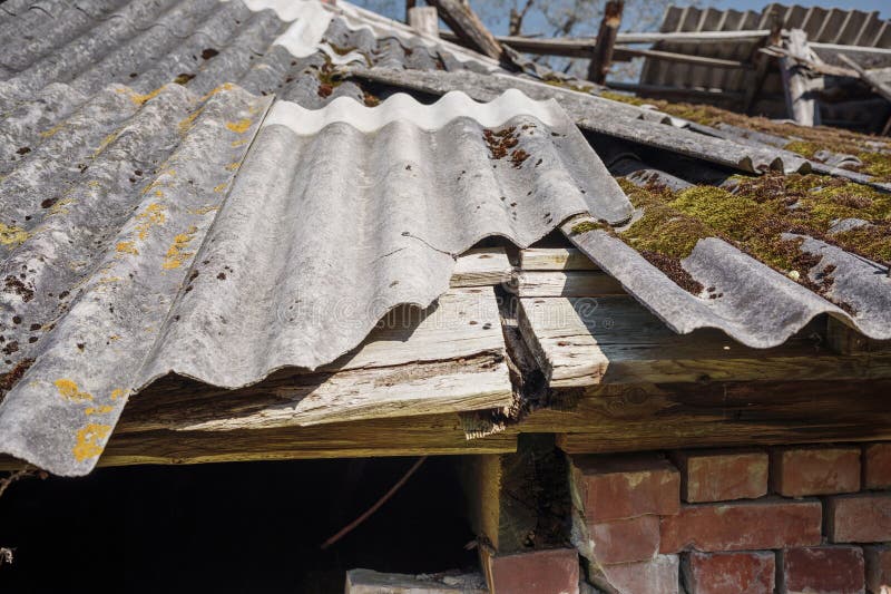 Old and Very Dangerous Asbestos Roof. Asbestos Dust in the Environment ...