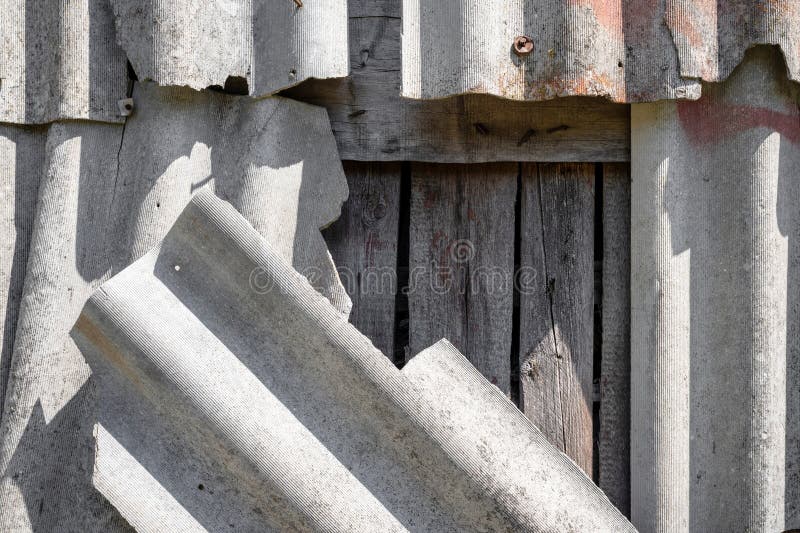 Old and Very Dangerous Asbestos Roof. Asbestos Dust in the Environment ...