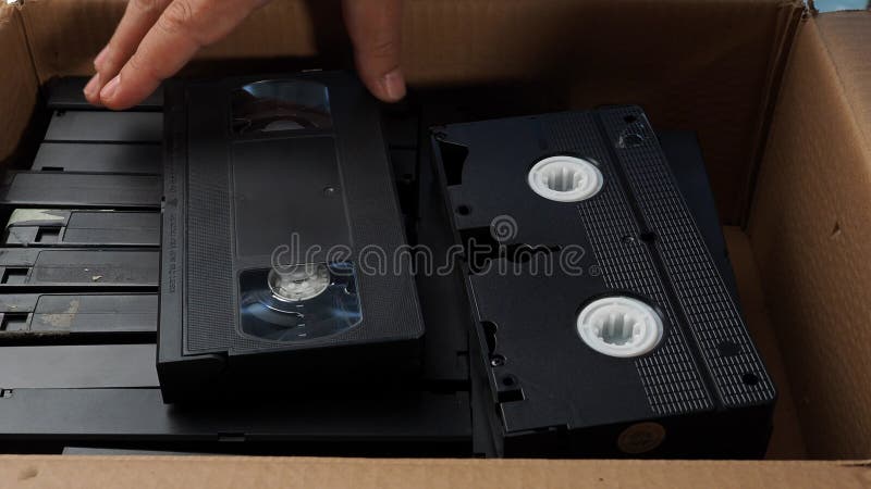 Old VHS Tapes in a Cardboard Box. Stock Footage - Video of horizontal ...