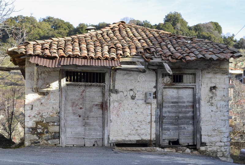 Old Village Building Wtih Ceramic Tiles and Stone Wall. Stock Image ...