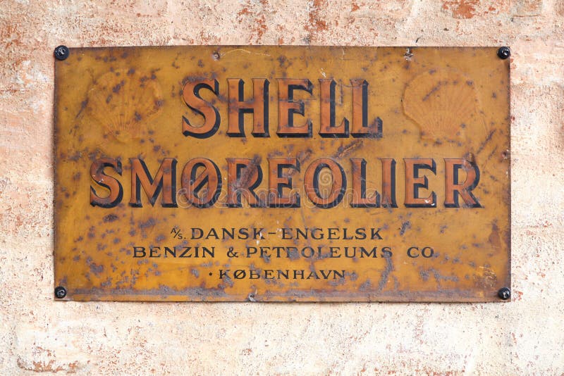 Old and Vintage Advertising with Shell Oil on a Wall Editorial Photo ...