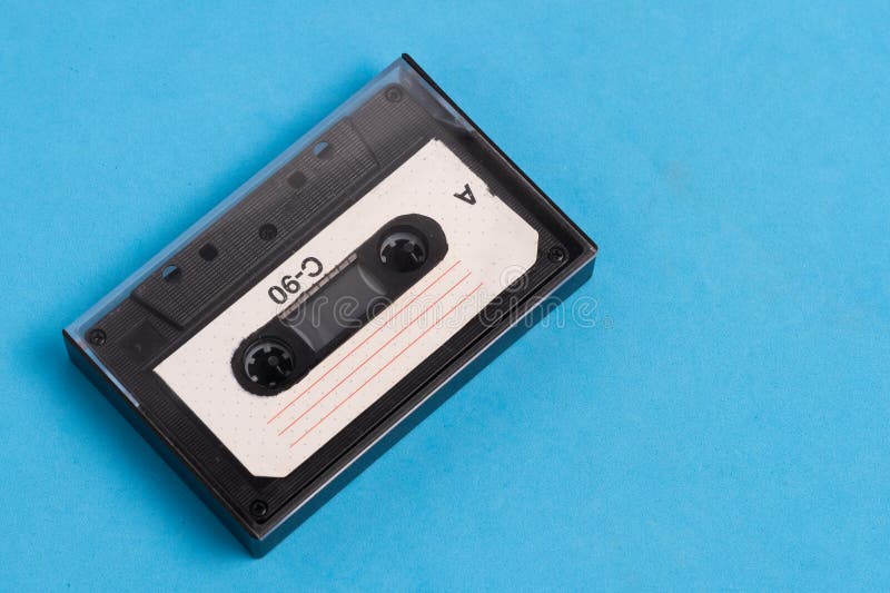 Old Vintage Audio Cassette on Blue Background Stock Photo - Image of ...