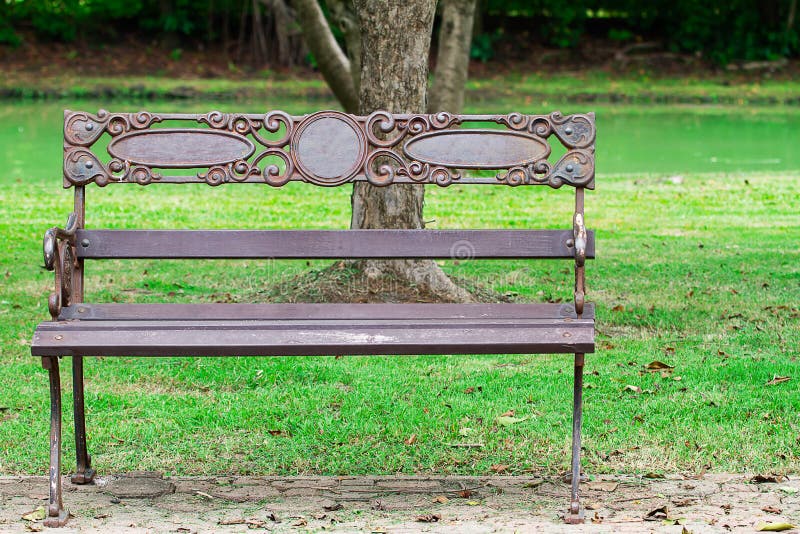 Old Vintage Grunge Rusty Iron and Wooden Bench in the Park Stock Image ...
