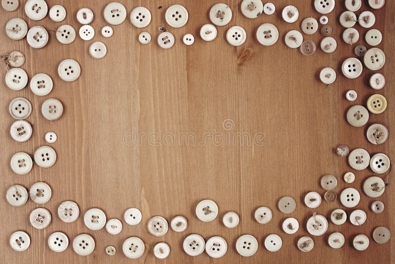 Old Vintage Buttons Frame Border On Wooden Background. Stock Image ...