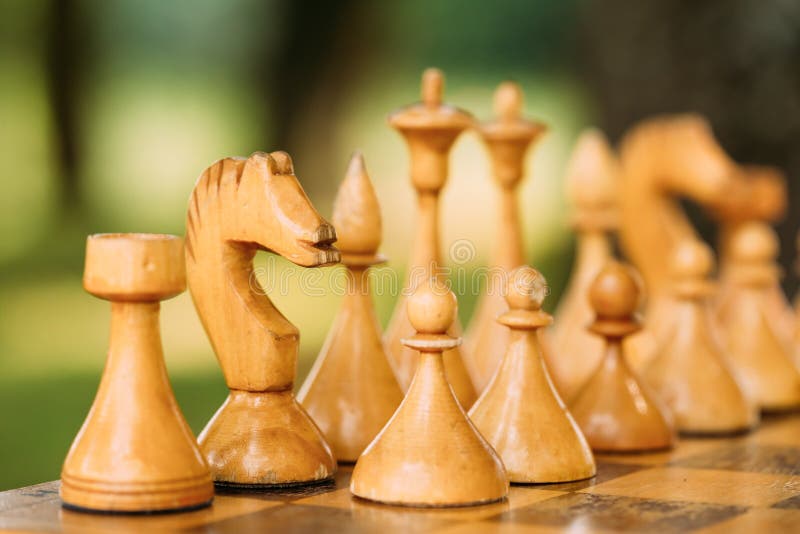 Old Vintage Chess Standing on Chessboard Stock Image - Image of piece ...