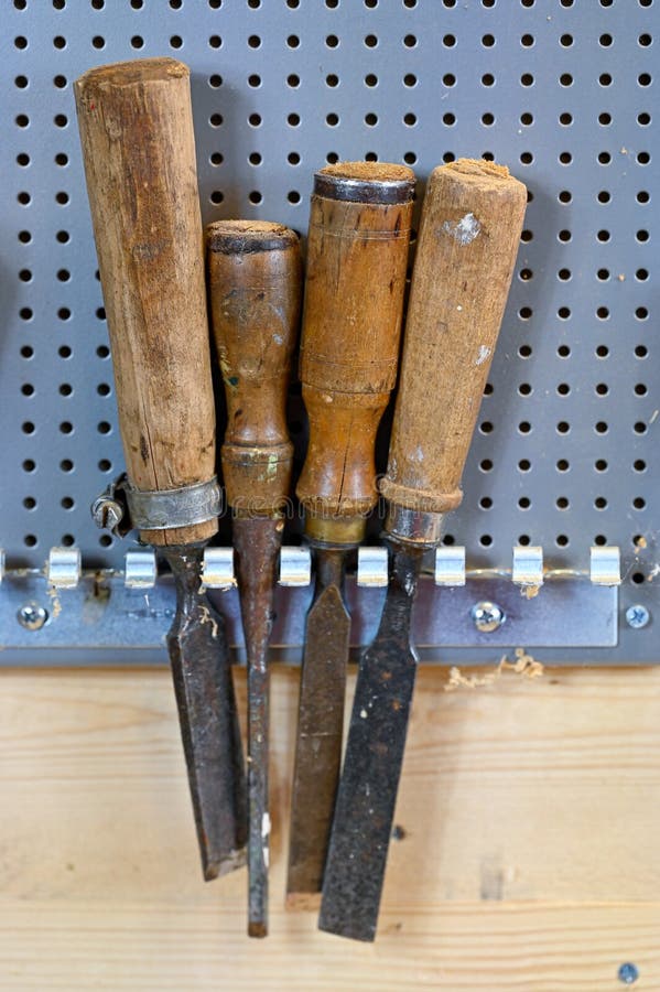 Old Vintage Chisels with Wooden Handles on Tool Board Stock Image ...