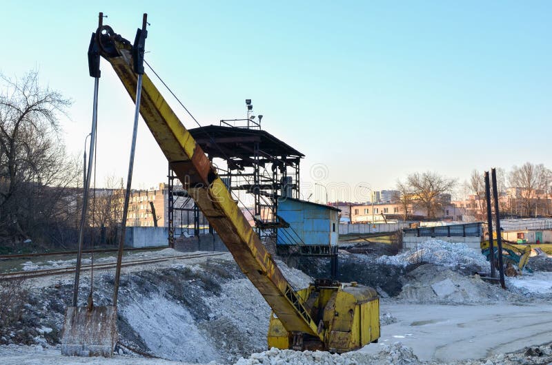 Old Digging Excavator in a Quarry Mining Rock Stock Photo - Image of ...