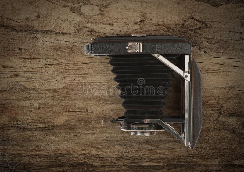 Old Vintage Folding Camera on Wood Stock Photo - Image of frame, wood ...