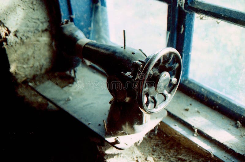 Old Vintage Hand Sewing Machine. Dirty, Stands on the Windowsill Stock ...
