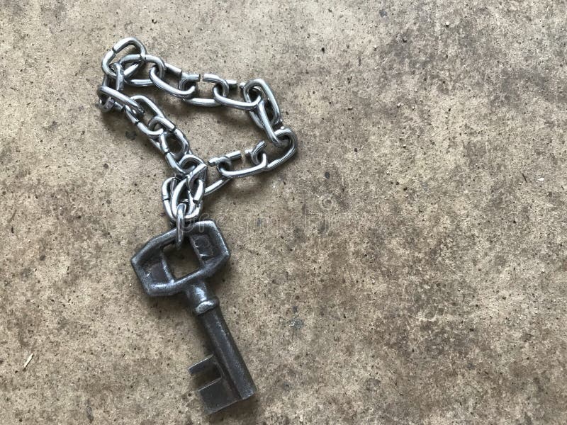 Old Vintage Key from a Padlock. with a Chain. Stock Photo - Image of ...