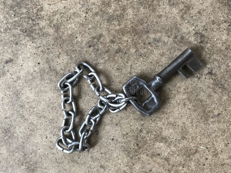 Old Vintage Key from a Padlock. with a Chain. Stock Image - Image of ...