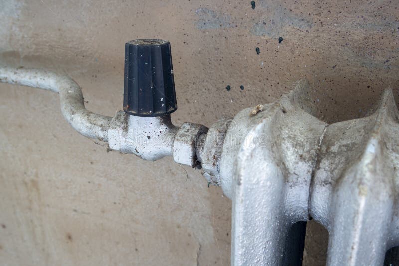 Old Vintage Radiator with Valve on the Wall Stock Photo - Image of ...